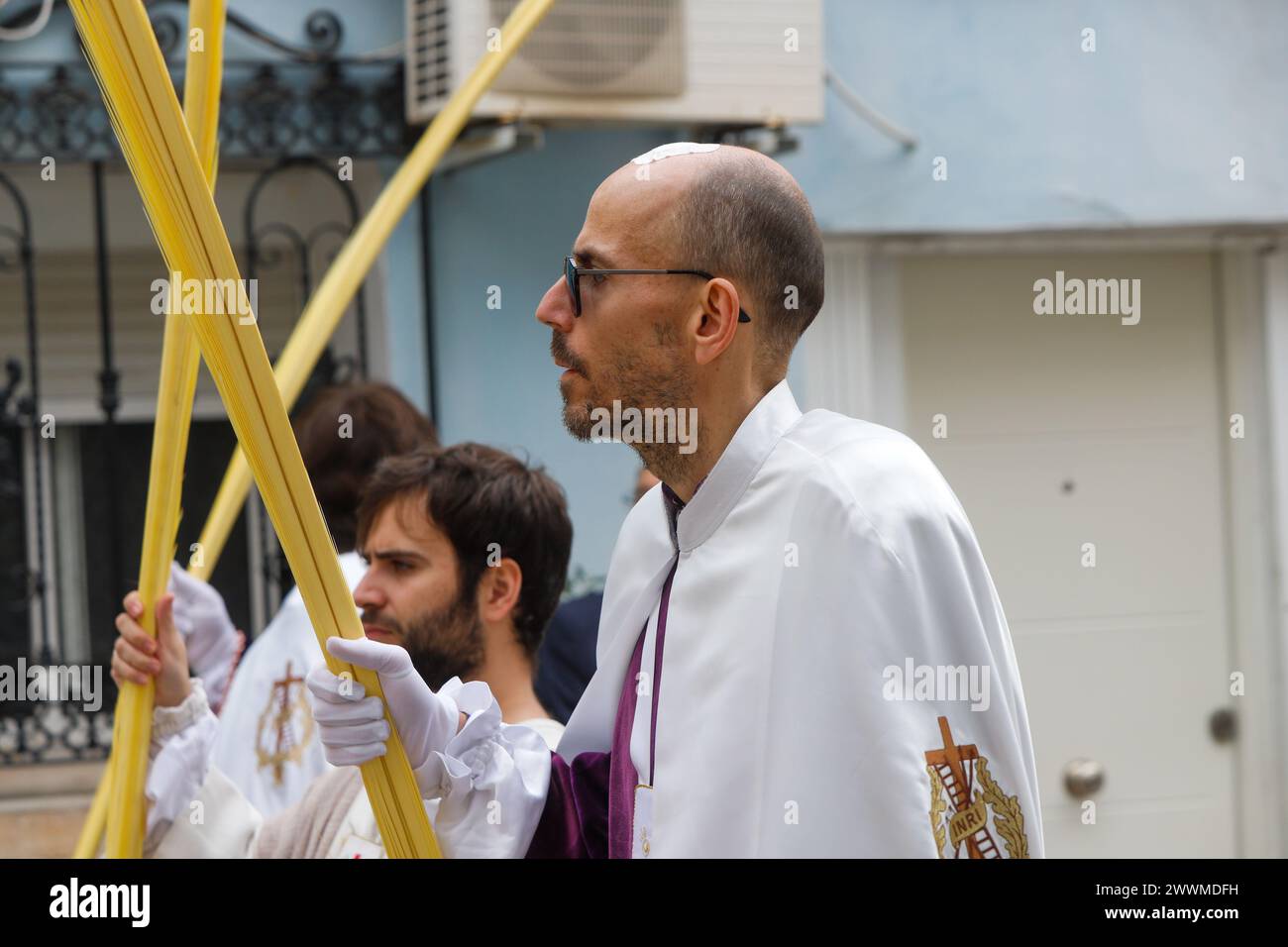 Penitents during a Holy week parade at Cabanyal quarter in Valencia ...