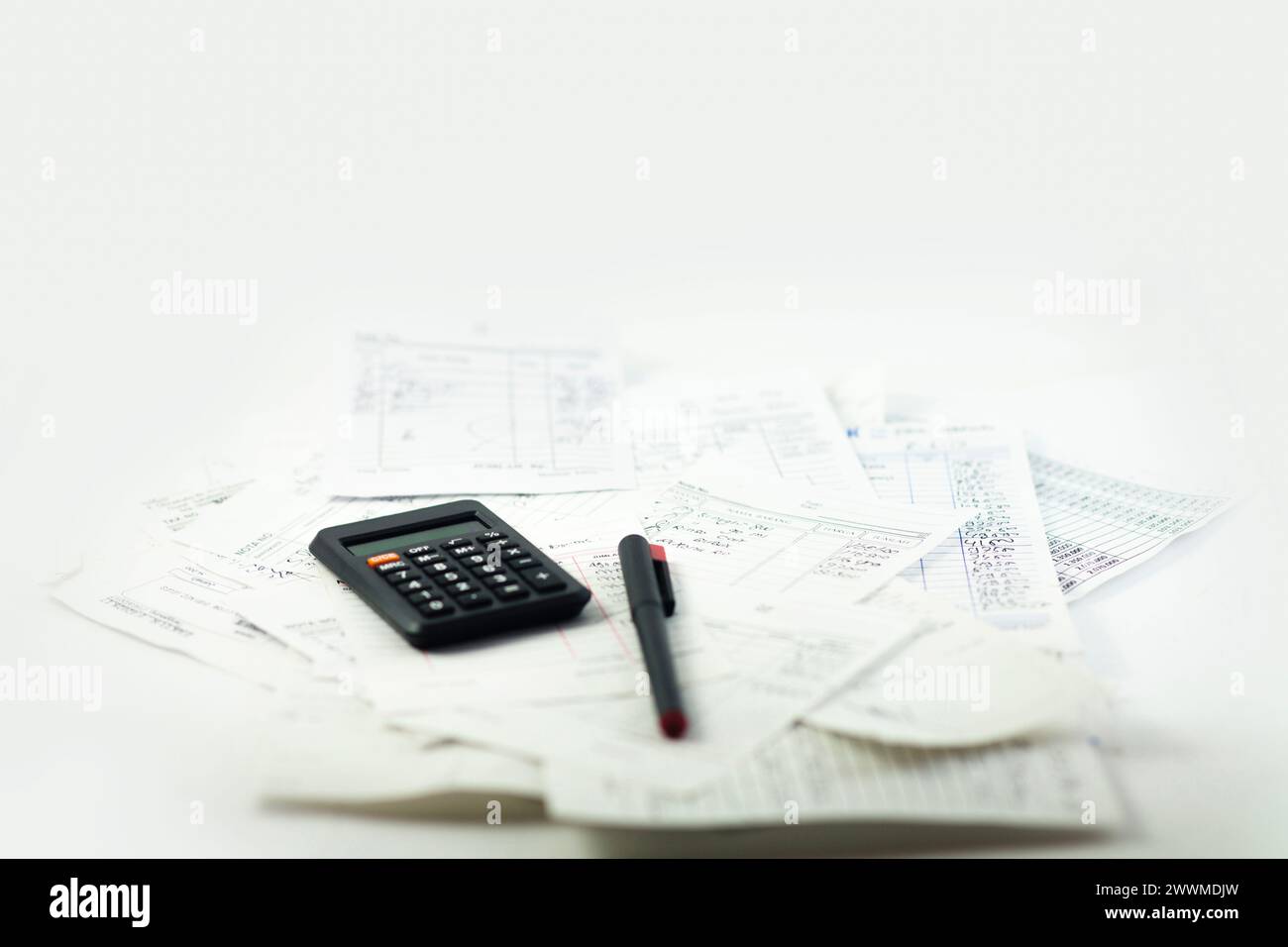 Accounting set up with pen, and calculator. isolated on a white ...