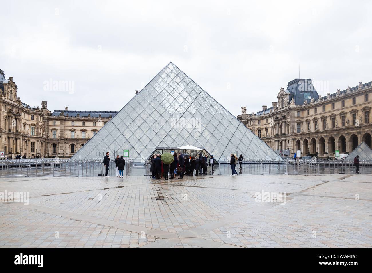 5th December 2023- Tourists outside the glass Pyramid at the entrance ...