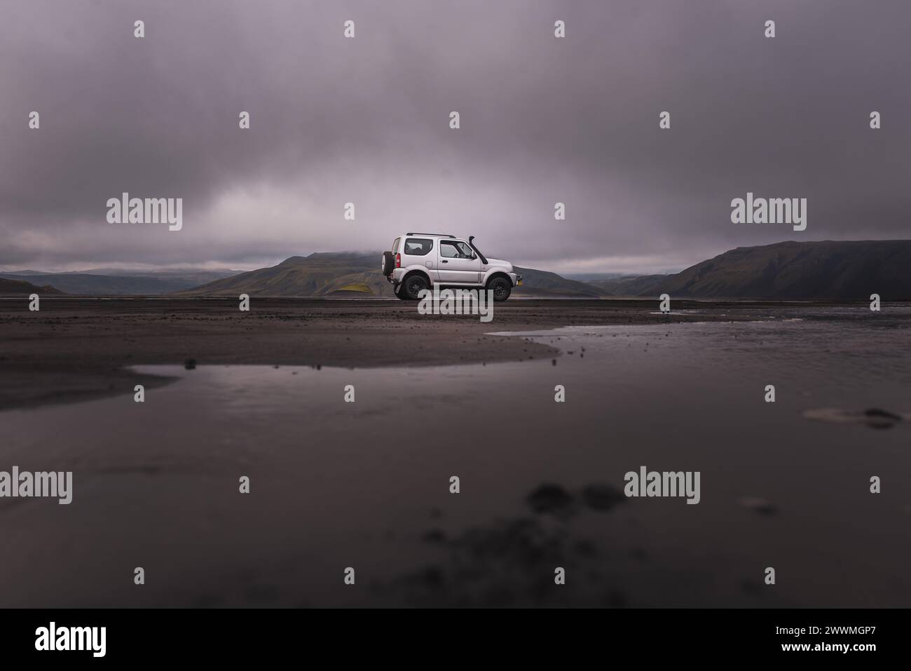 Side view of small 4x4 while exploring highlands of Iceland Stock Photo ...