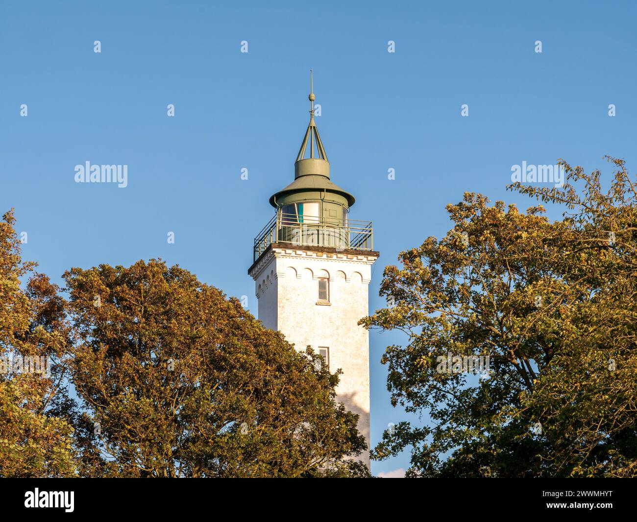 Tower of church and lighthouse of Tunø island in town of Tunø By ...