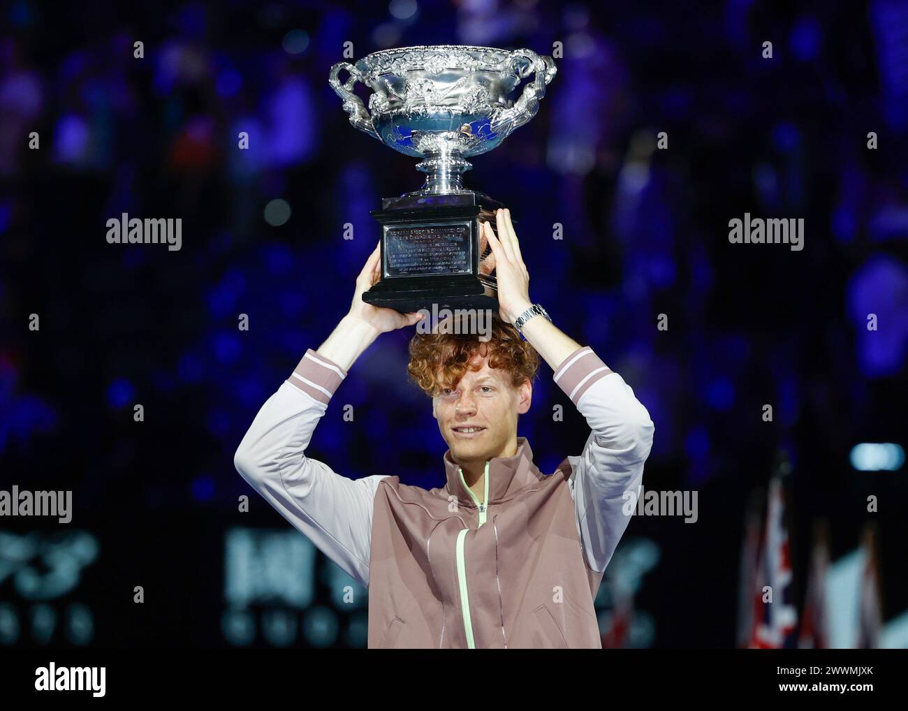Grand Slam winner Jannik Sinner (ITA) holding up the trophy at the ...