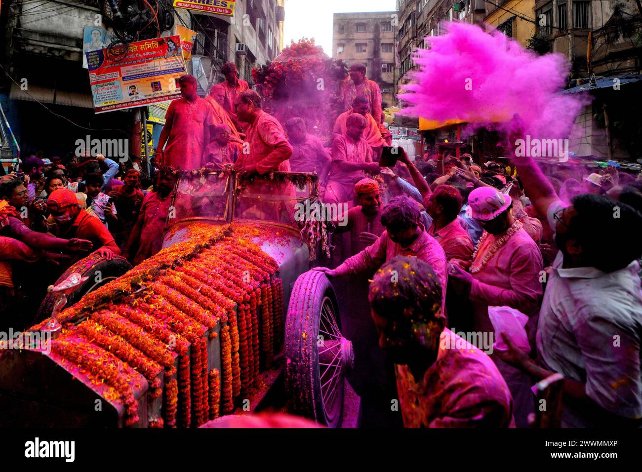 Kolkata, India. 23rd Mar, 2024. People seen throwing colorful powders ...