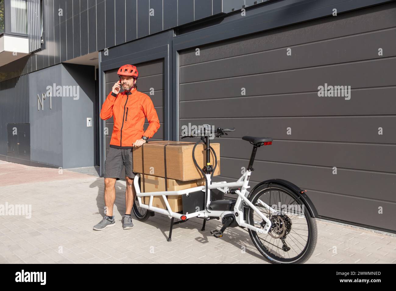 Messenger on a bike hi-res stock photography and images - Alamy