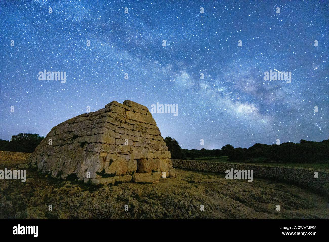 The Naveta des Tudons, at night, with the Milky Way in the background ...