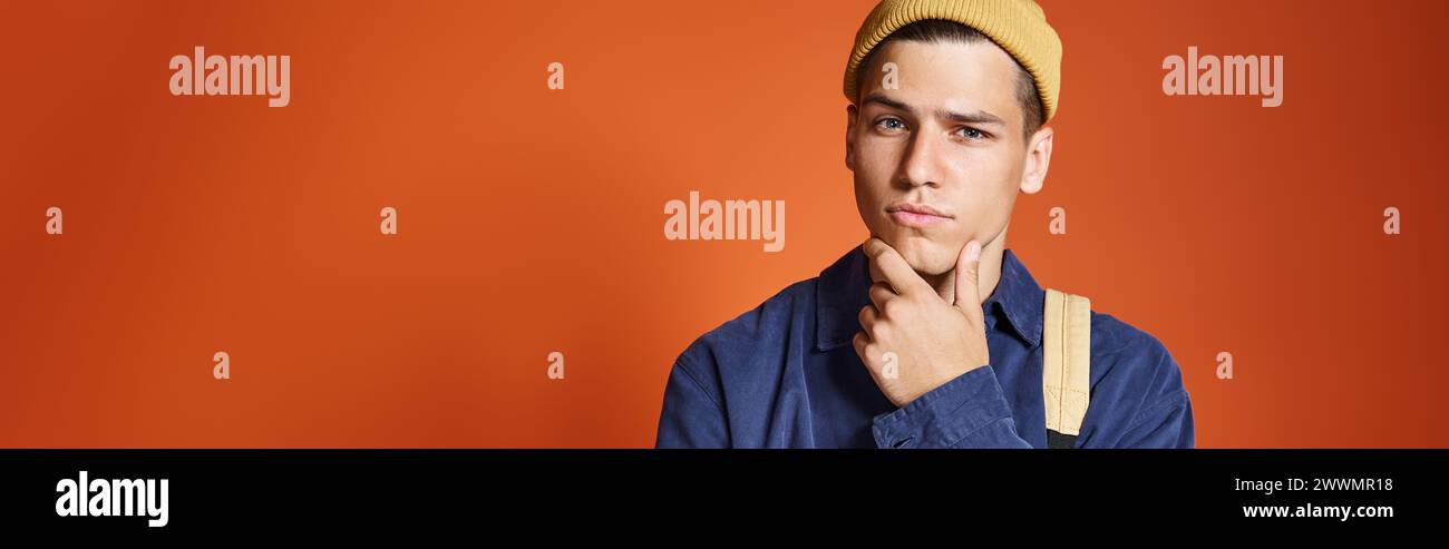 banner of young man in yellow hat thinking about idea against ...