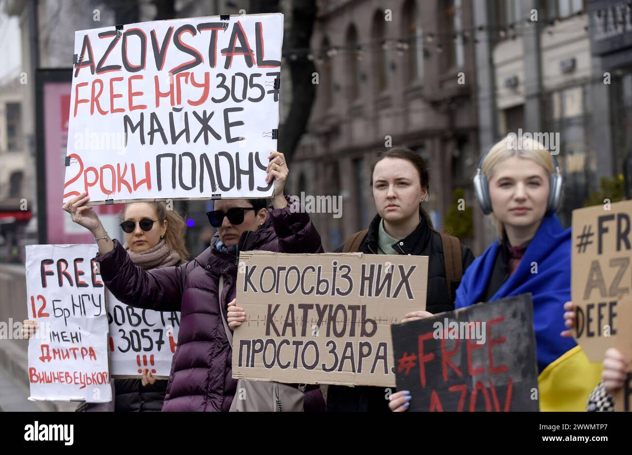 KYIV, UKRAINE - MARCH 24, 2024 - Activists hold placards during the Don ...
