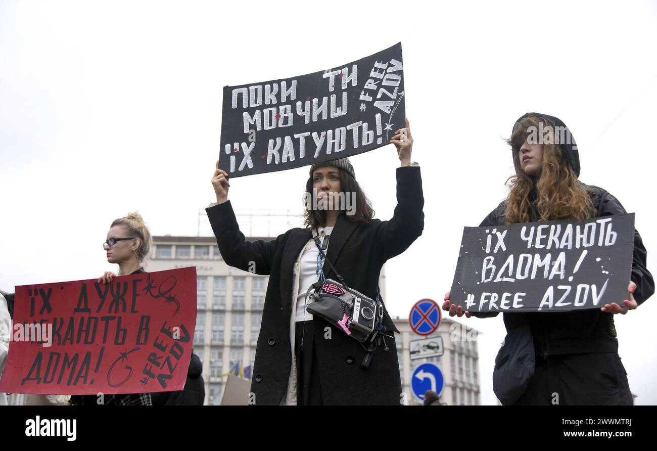 KYIV, UKRAINE - MARCH 24, 2024 - Activists hold placards during the Don ...