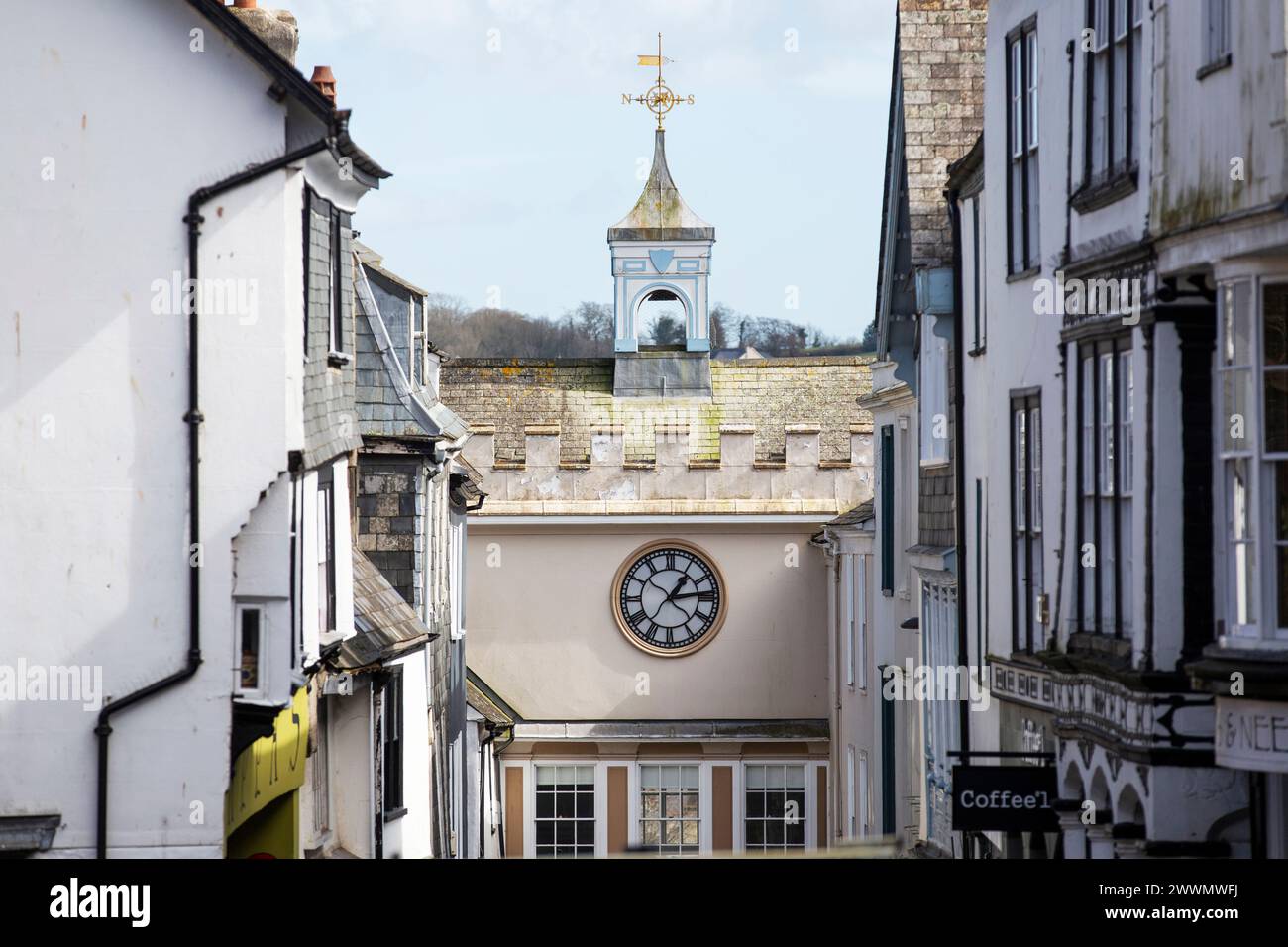 View of Totnes town centre upper with clock and spire Stock Photo - Alamy