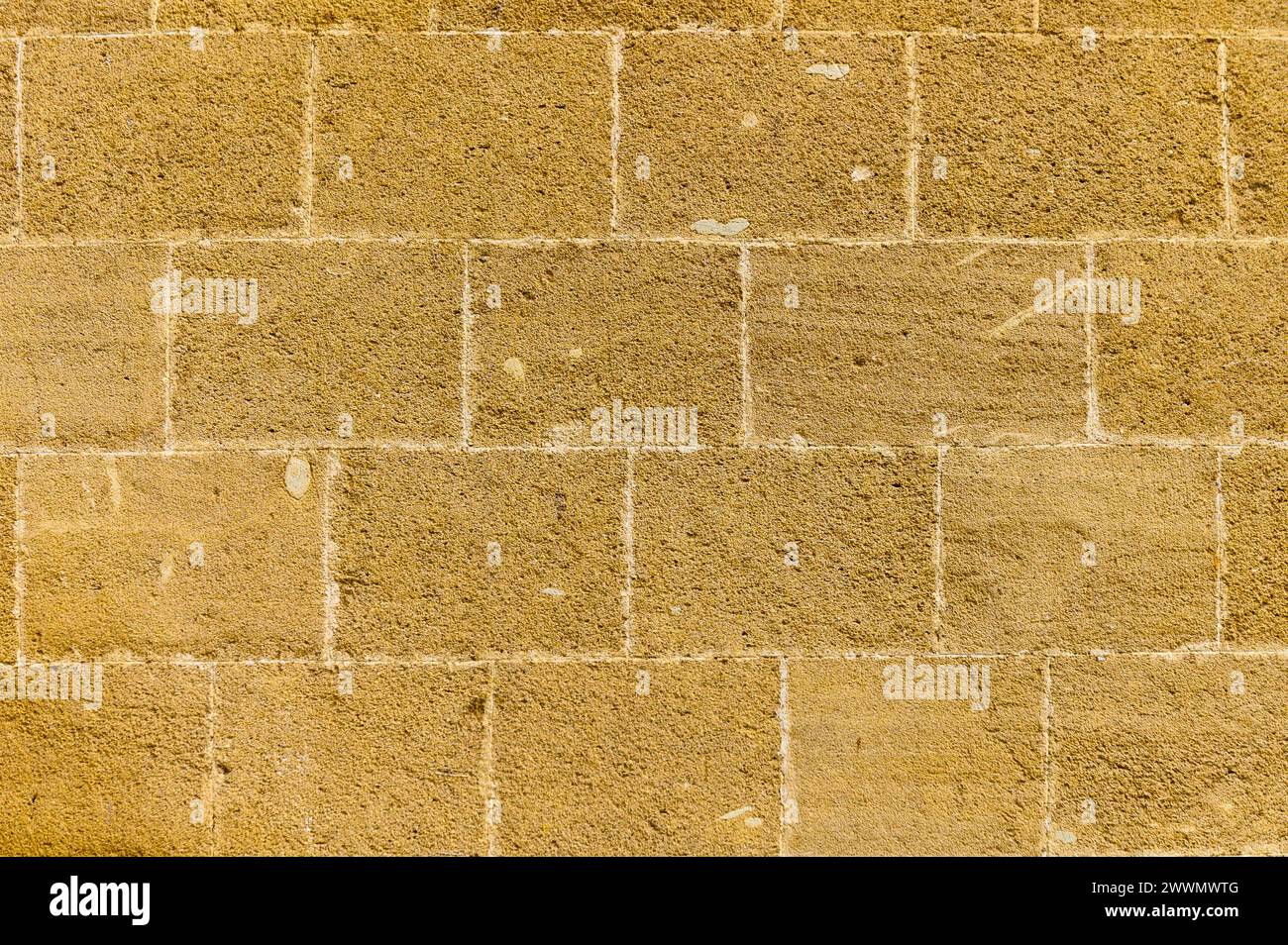 Yellow brick wall. Facade of an old building. Architectural background ...
