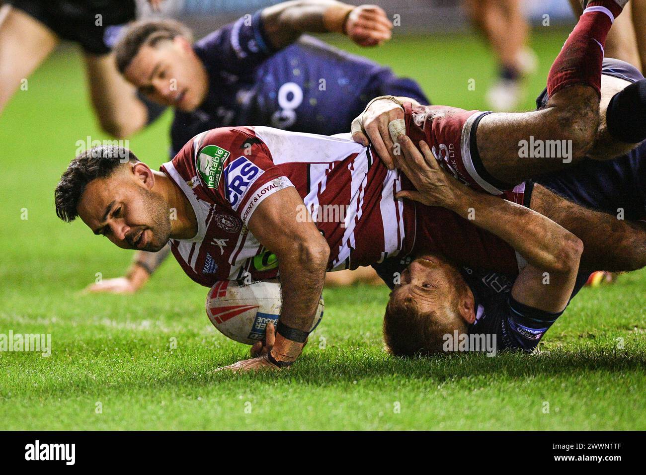 Wigan, England - 22nd March 2024 Bevan French of Wigan Warriors scores ...