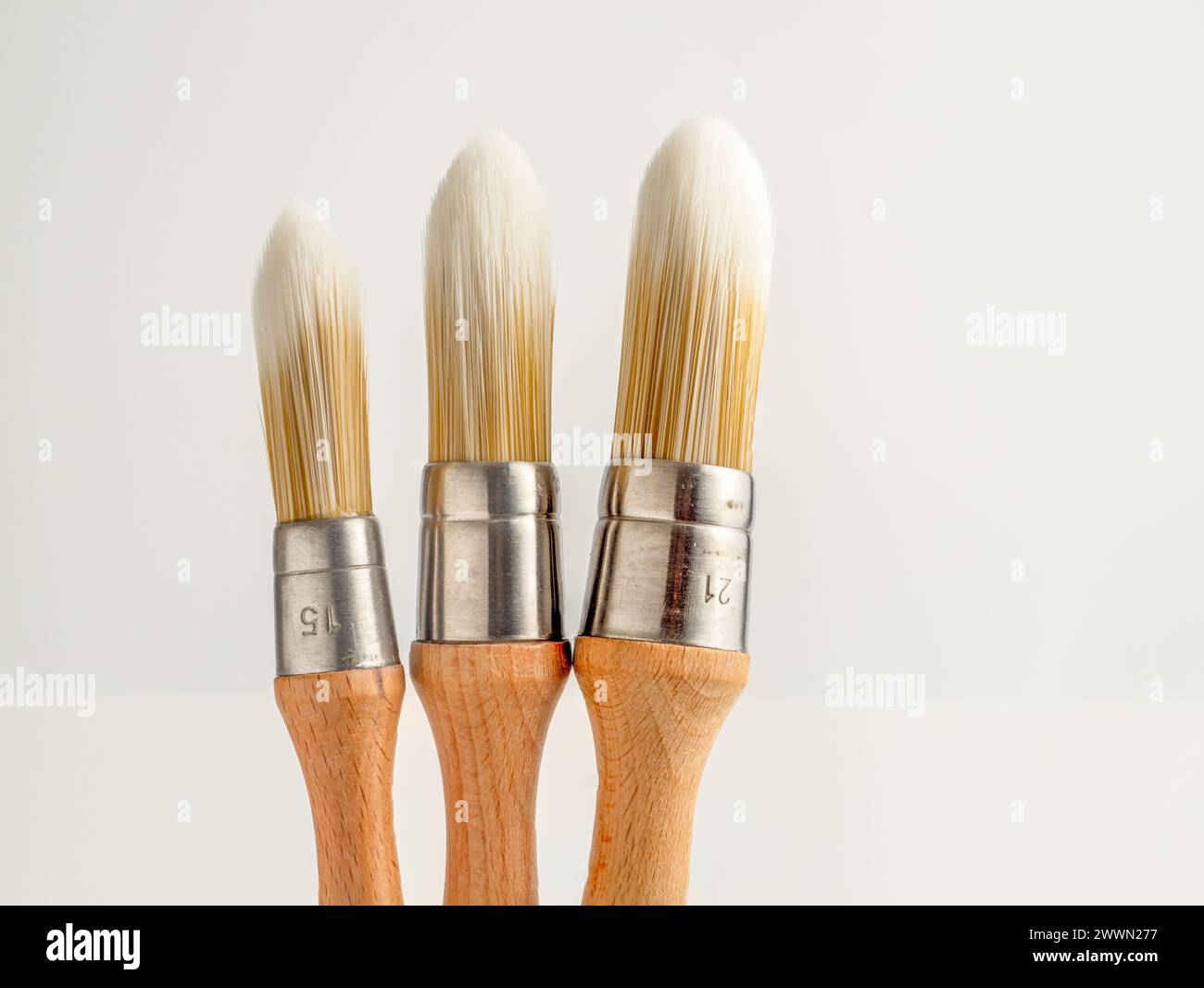Close up of a traditional set of bristle sash brushes isolated on a ...