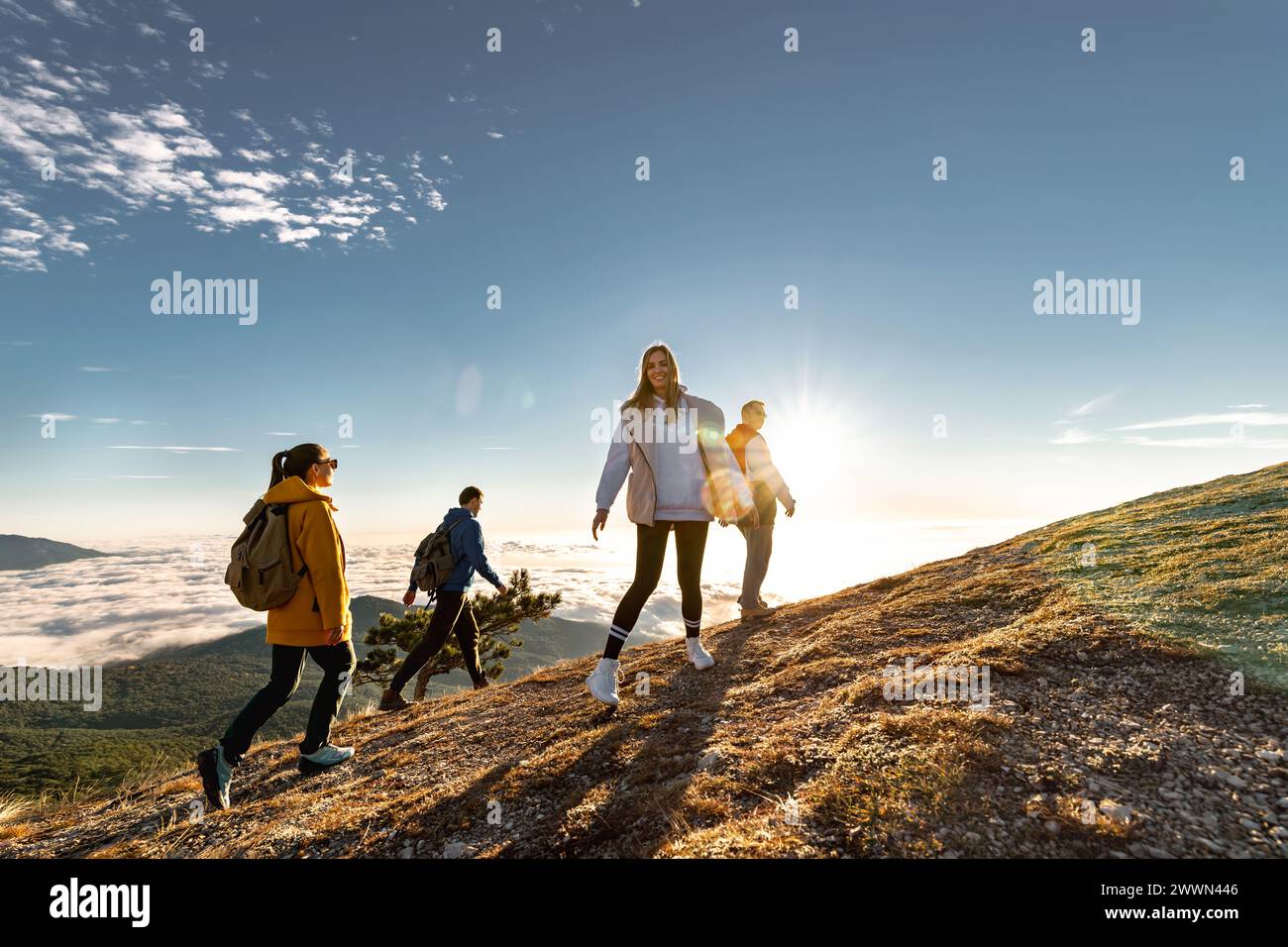 Group tourists walks mountains hi-res stock photography and images - Alamy