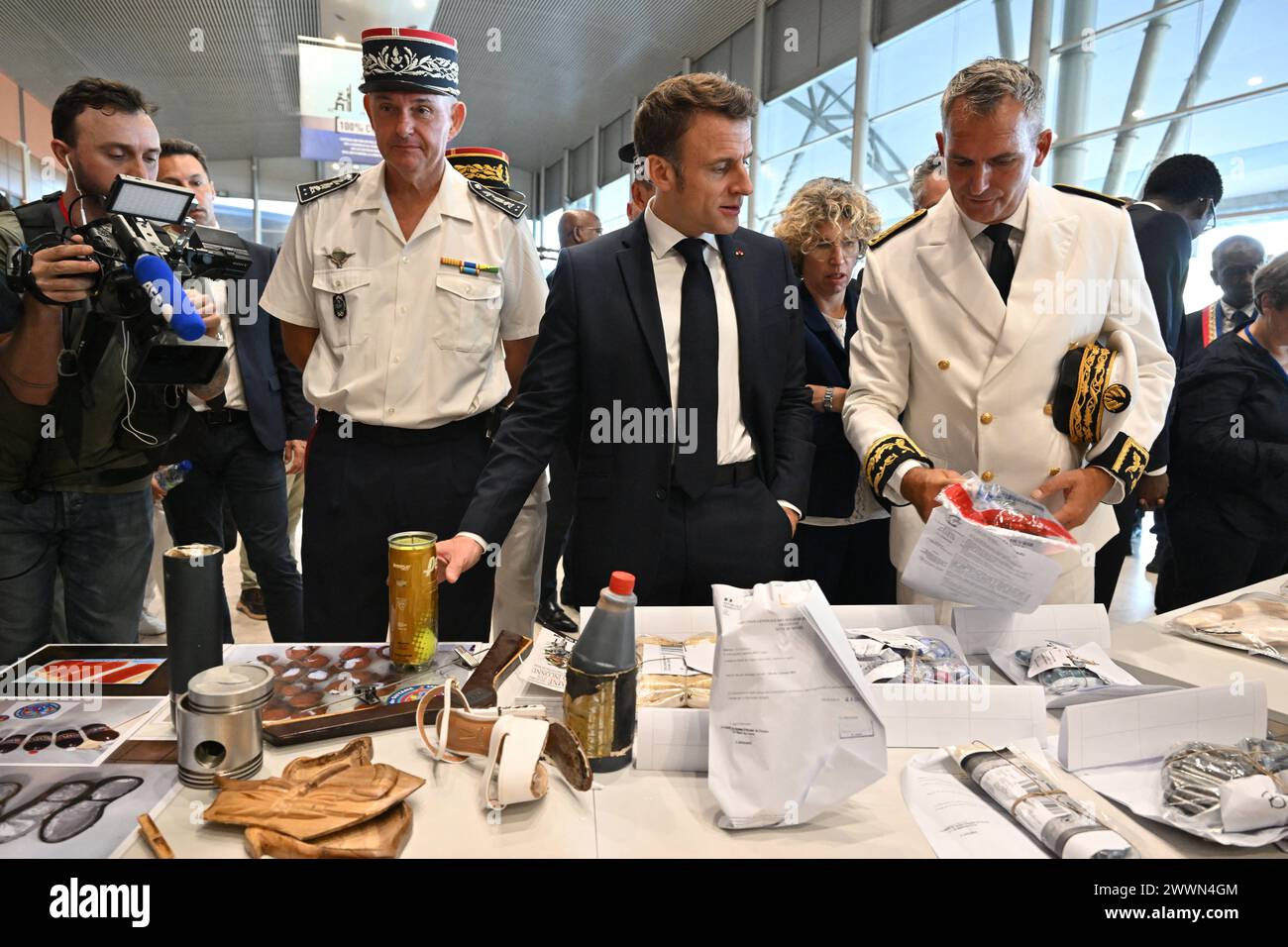 Cayenne, France. 25th Mar, 2024. French President Emmanuel Macron (C ...