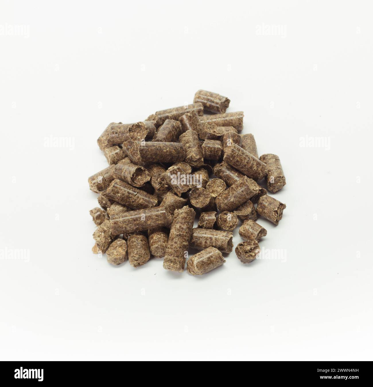 stack of wooden pellets for bio energy, white background, isolated ...