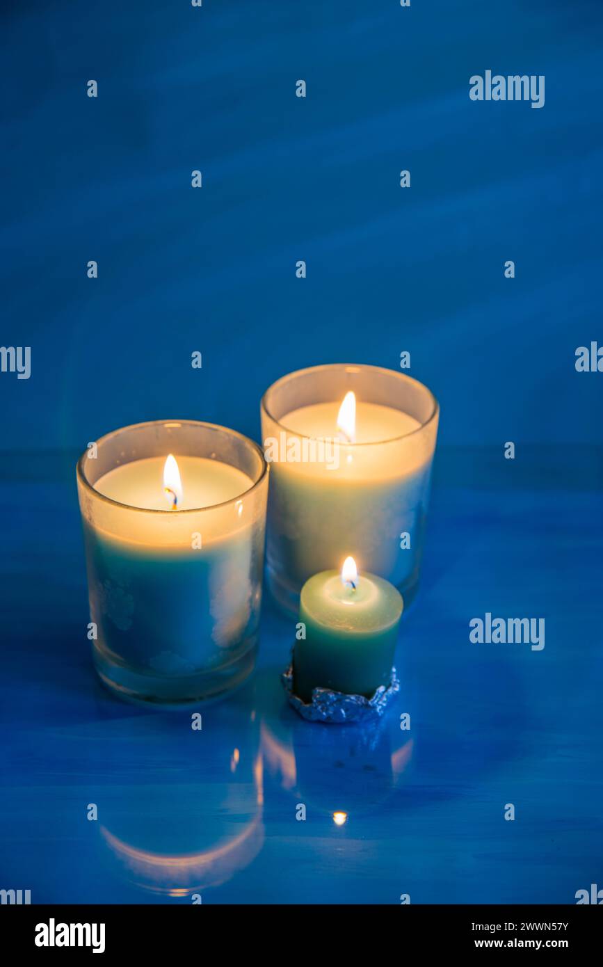 Candles lit vertical hi-res stock photography and images - Alamy
