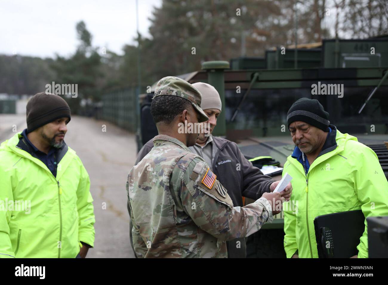 U.S. Army Staff Sgt. Marquise Miller (center), line hall movement non ...