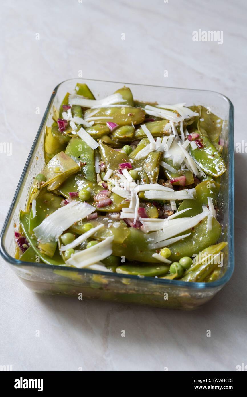 Snow Peas Salad with Parmesan Cheese and Red Onions. ready to eat Stock ...