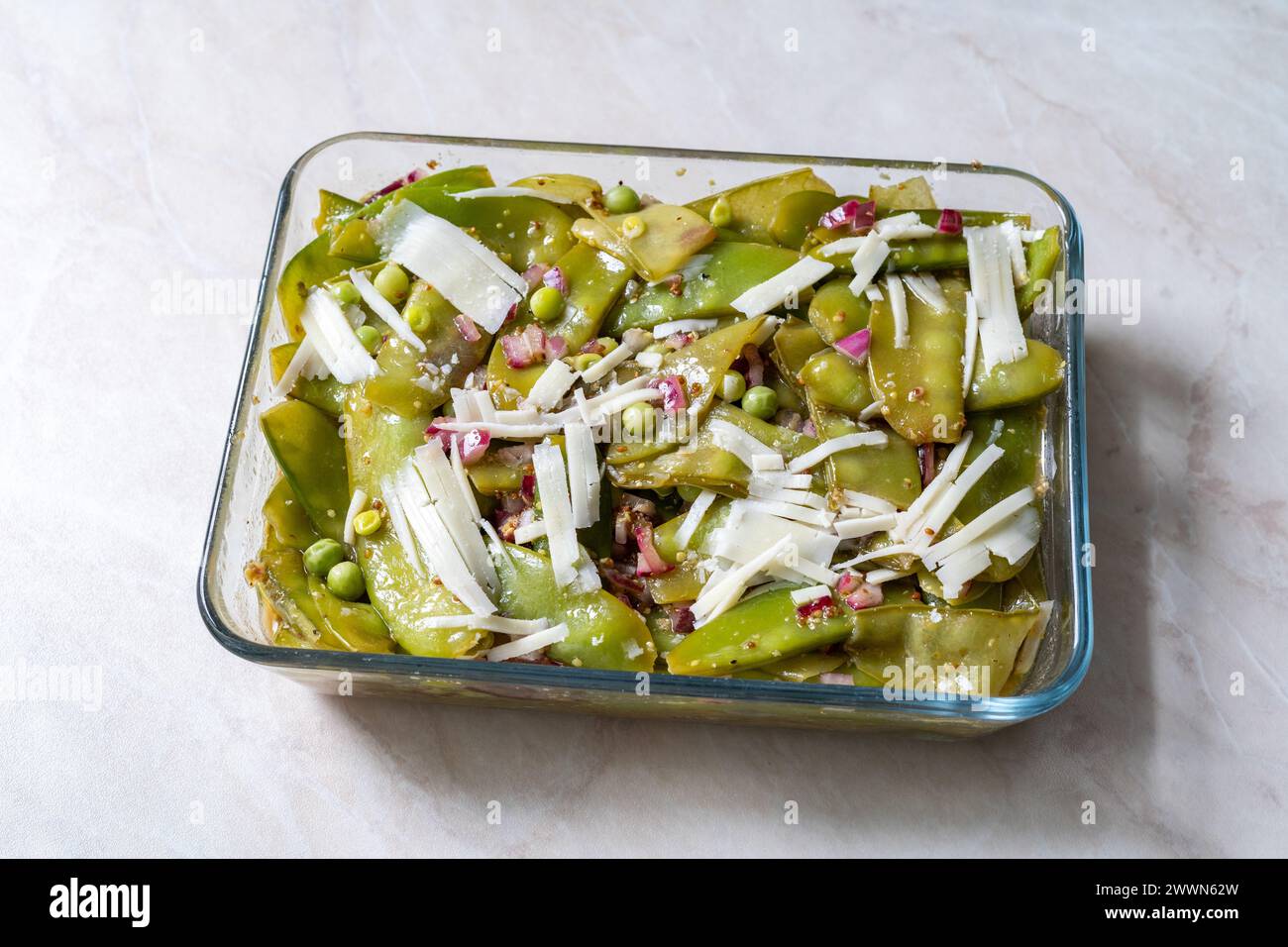 Snow Peas Salad with Parmesan Cheese and Red Onions. ready to eat Stock ...