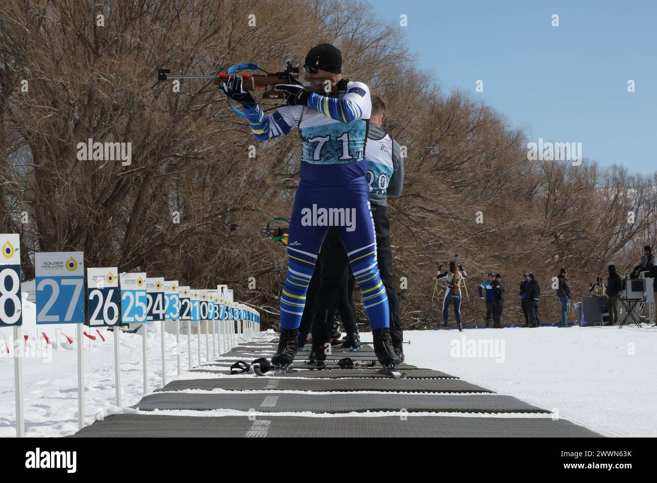 Joseph Woodruff, Minnesota National Guard, takes aim while ...