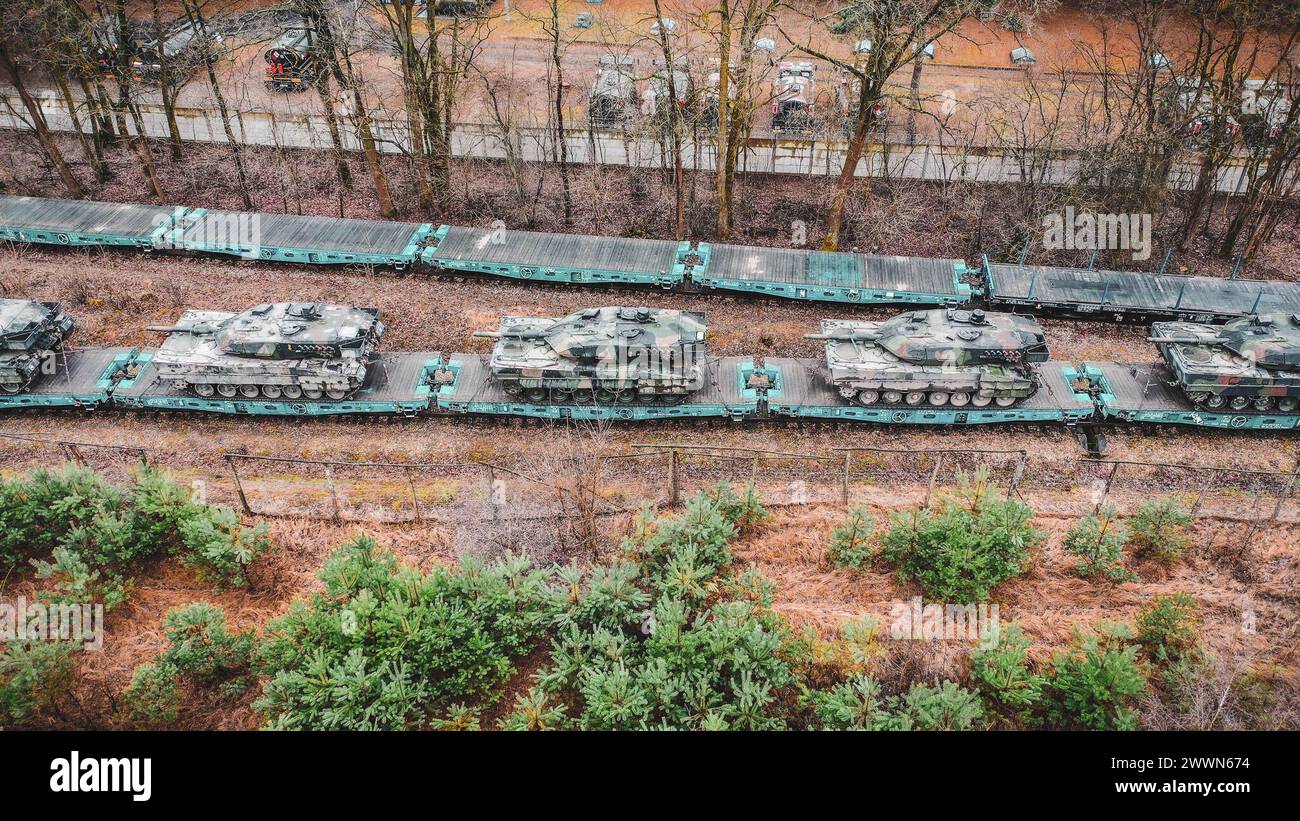 Aerial photo of Polish Leopard tanks being transported on train tracks ...