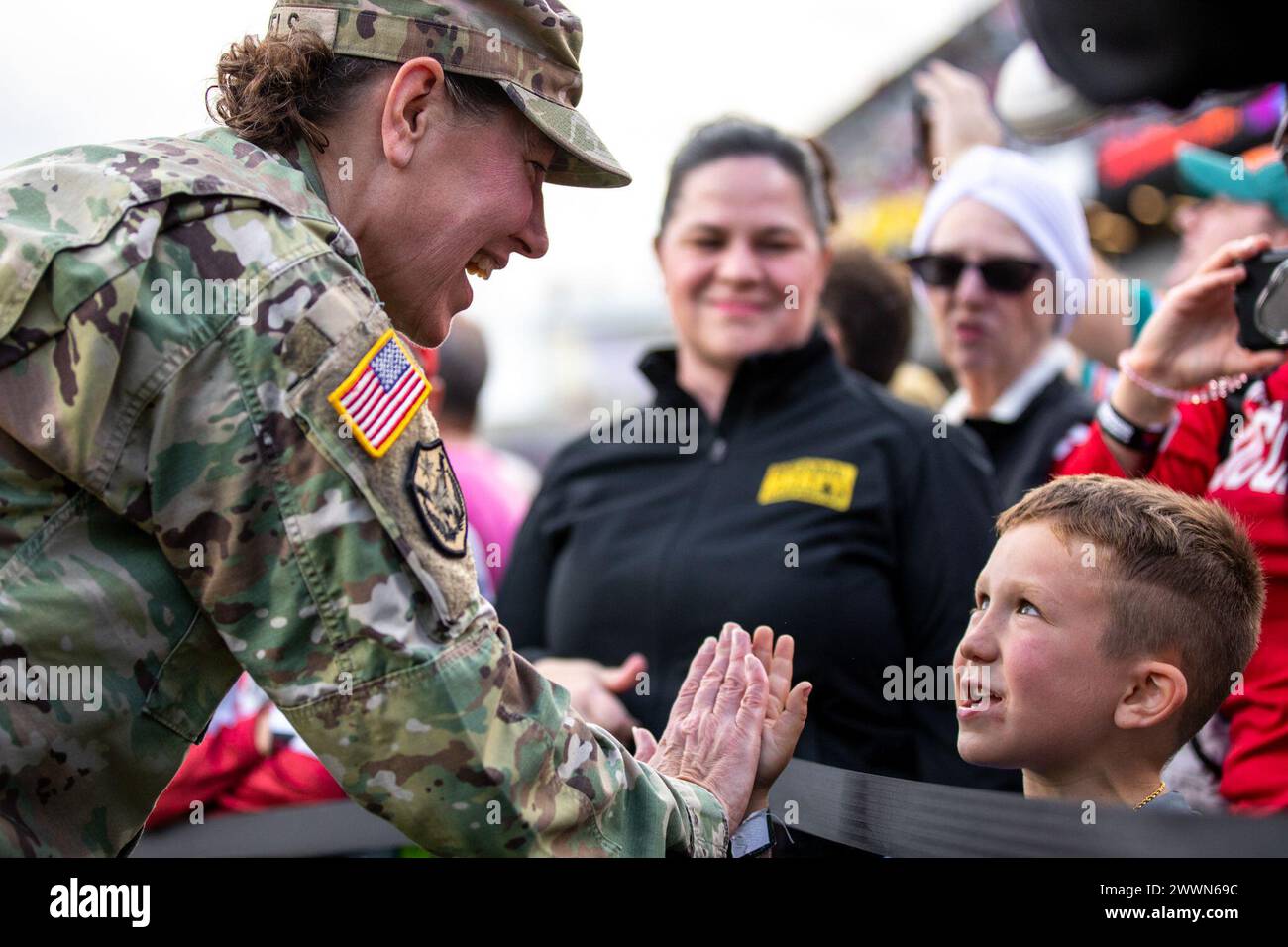 Chief of the Army Reserve Lt. Gen. Jody Daniels greets fans along the ...