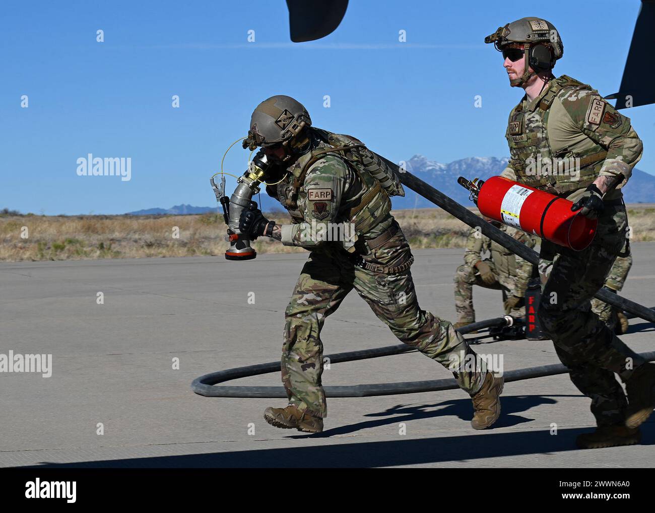 U.S. Air Force Senior Airman Oliver Wendland, right, and Tech. Sgt ...