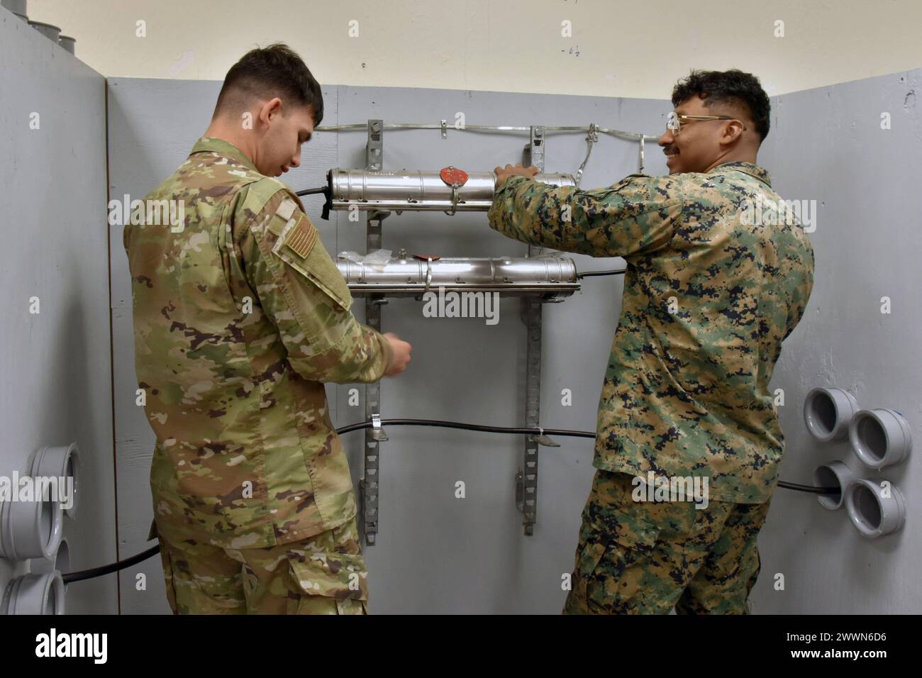Two students at the 364th Training Squadron's Cable and Antenna Systems ...