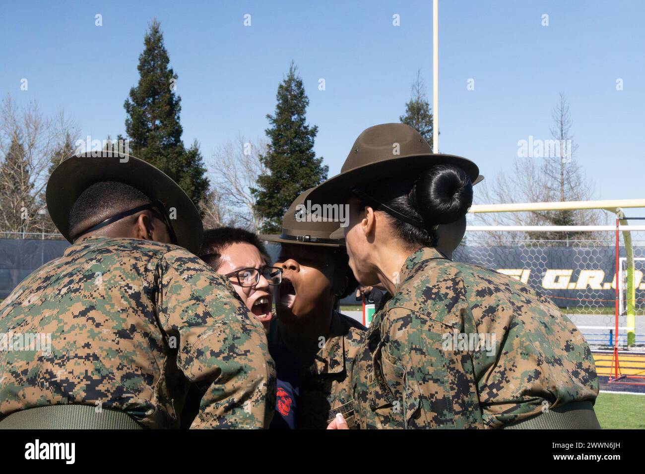 U.S. Marine Corps drill instructors with Marine Corps Recruit Depot San Diego instruct a poolee ...
