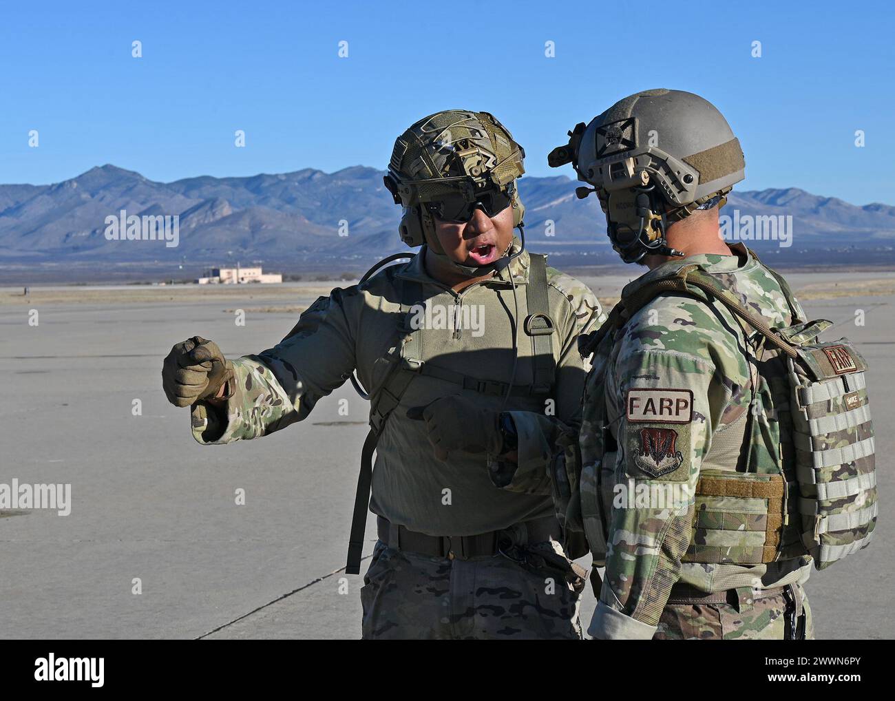 U.S. Air Force Tech. Sgt. Brian Bell, left, 79th Rescue Squadron ...