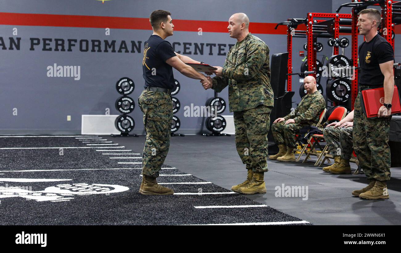 U.S. Marines Corps Lt. Col. Kirk Whittenberg, center right, deputy of ...