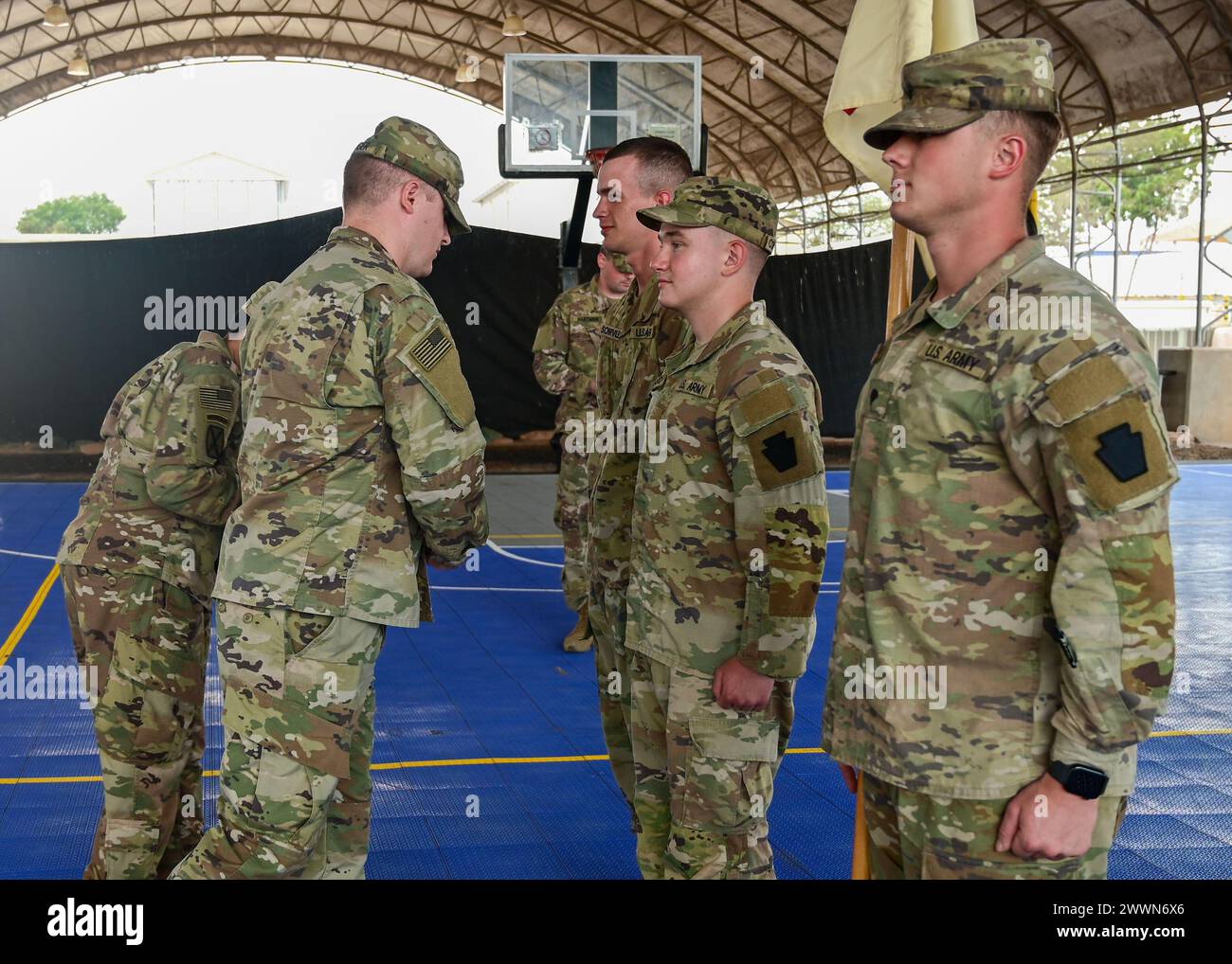 U.S. Army Cpl. Andrew Somerville, a wheeled vehicle mechanic, and U.S ...