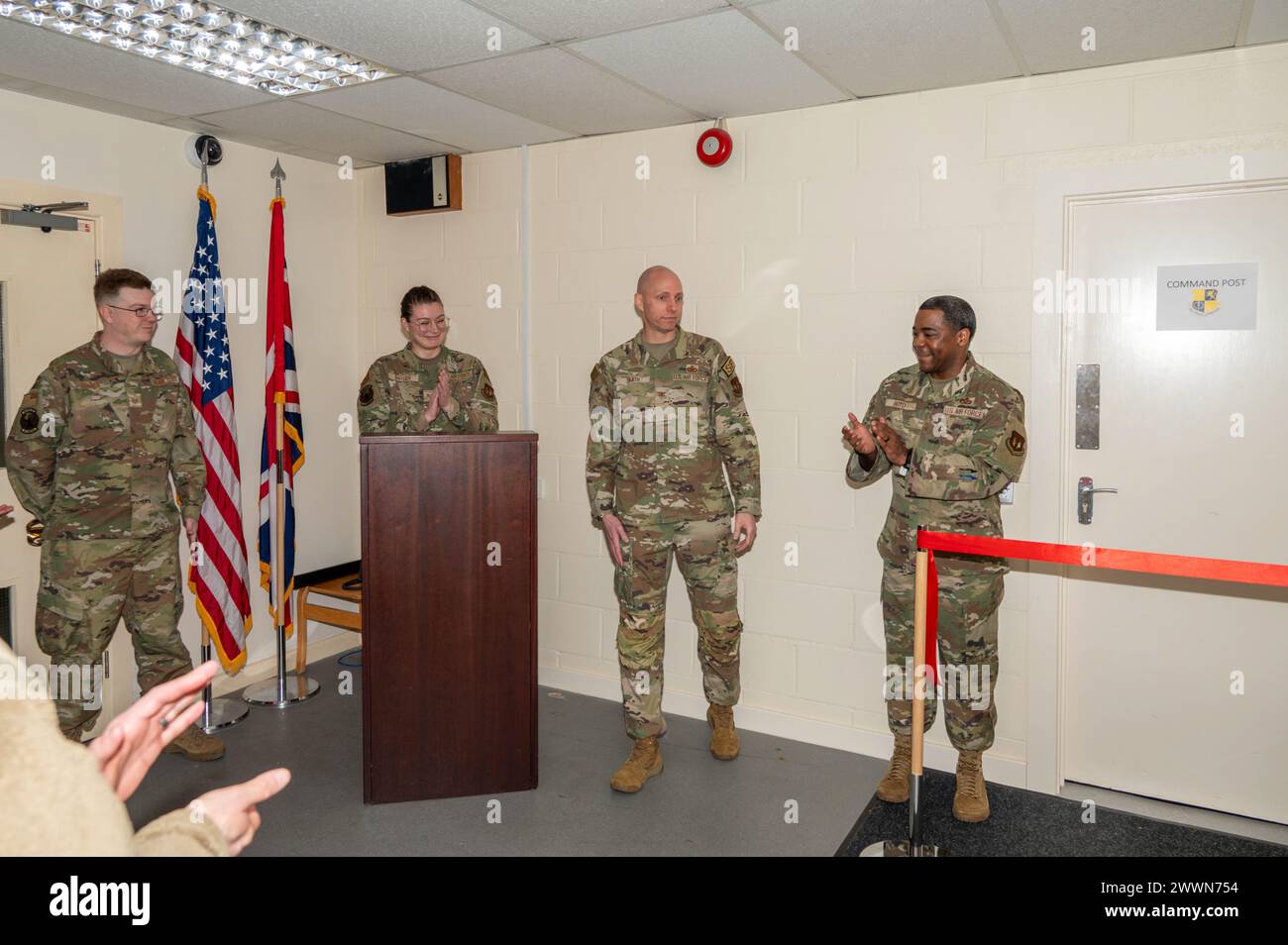 Pathfinders applaud during a ribbon cutting ceremony at RAF Fairford ...