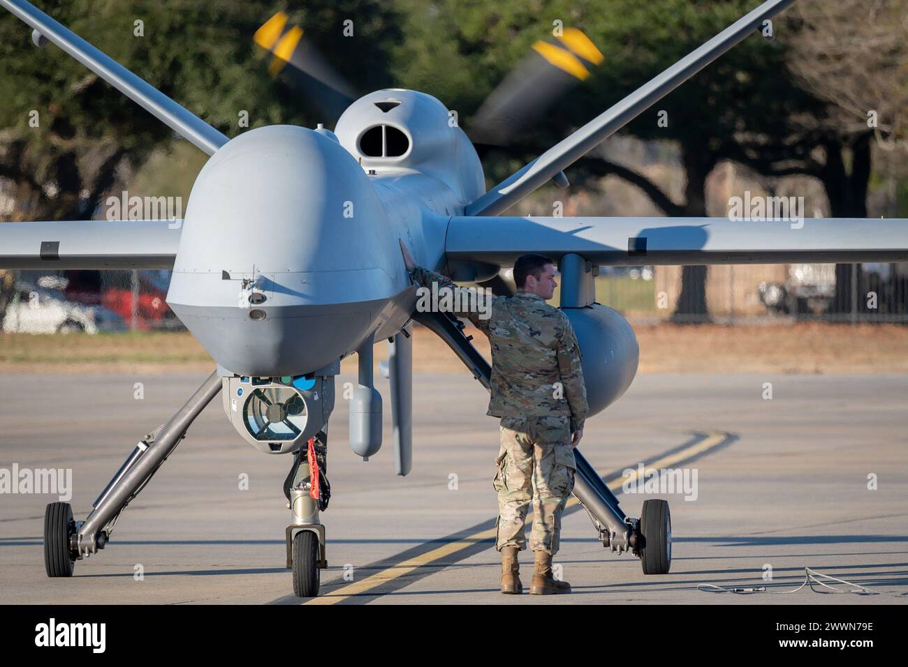 U.S. Air Force Tech. Sgt. Jordan Pool, 492nd Attack Squadron remotely piloted aircraft crew ...