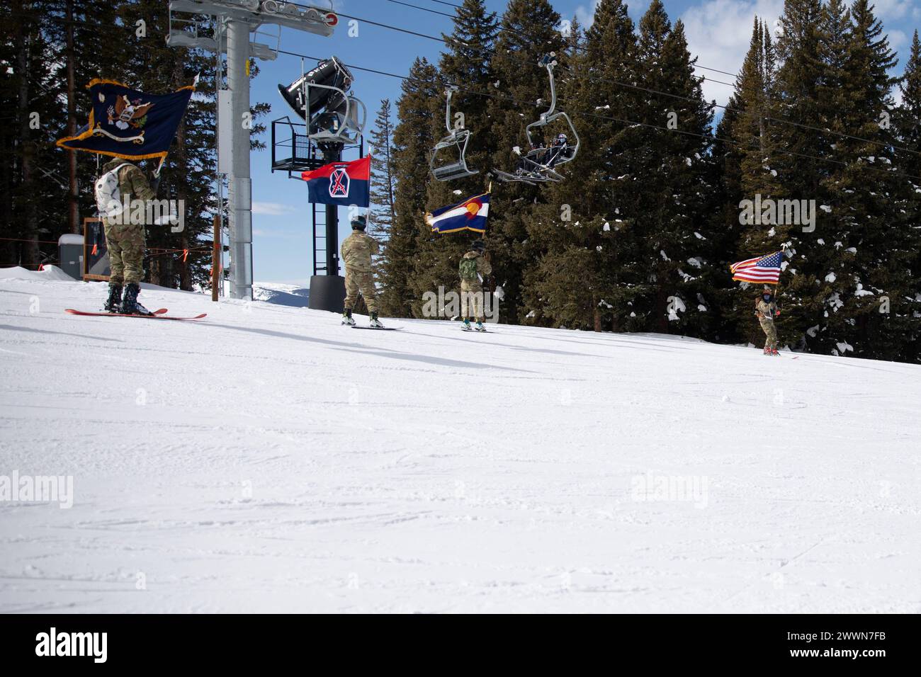 Spc. Sam Shomento (right), an instructor with the Mountain Training ...