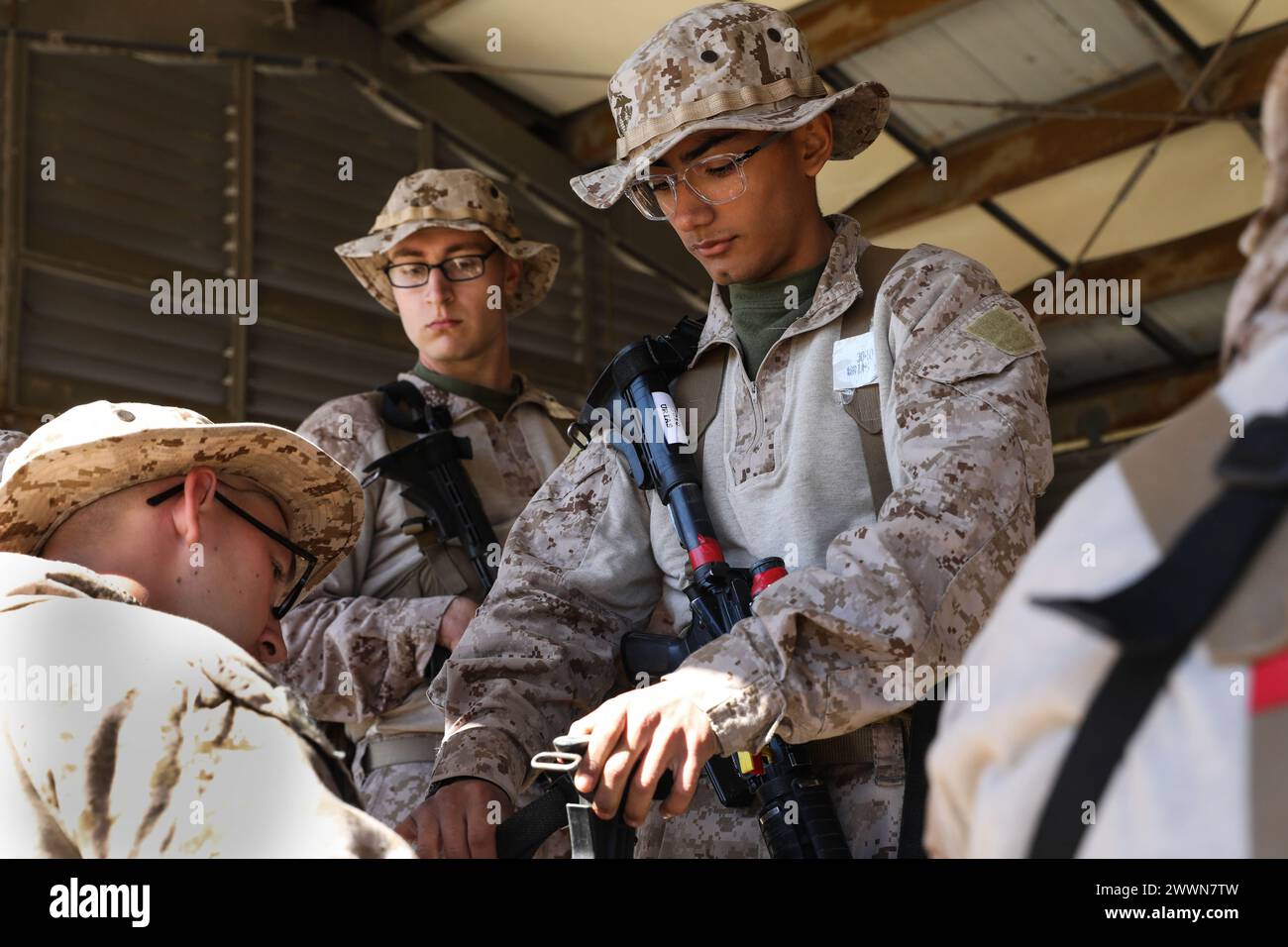 Recruits with Kilo Company, 3rd Recruit Training Battalion, receive ...
