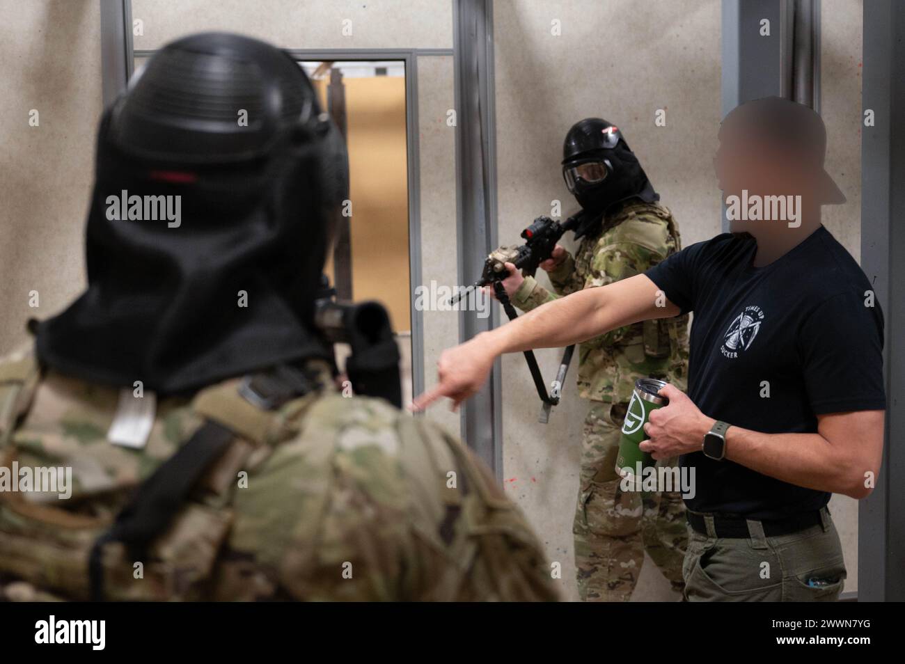 A member of the El Paso County SWAT instructs members of the 310th Security Forces Squadron on ...