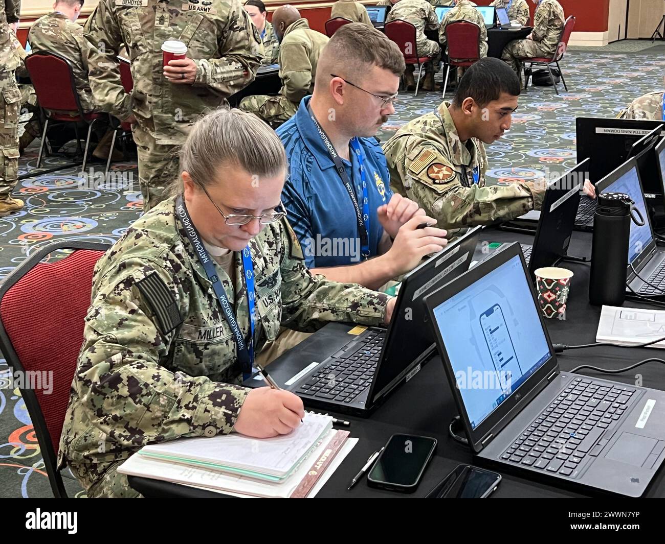 Competitors engage in the Open-Source Collection challenge during the ...