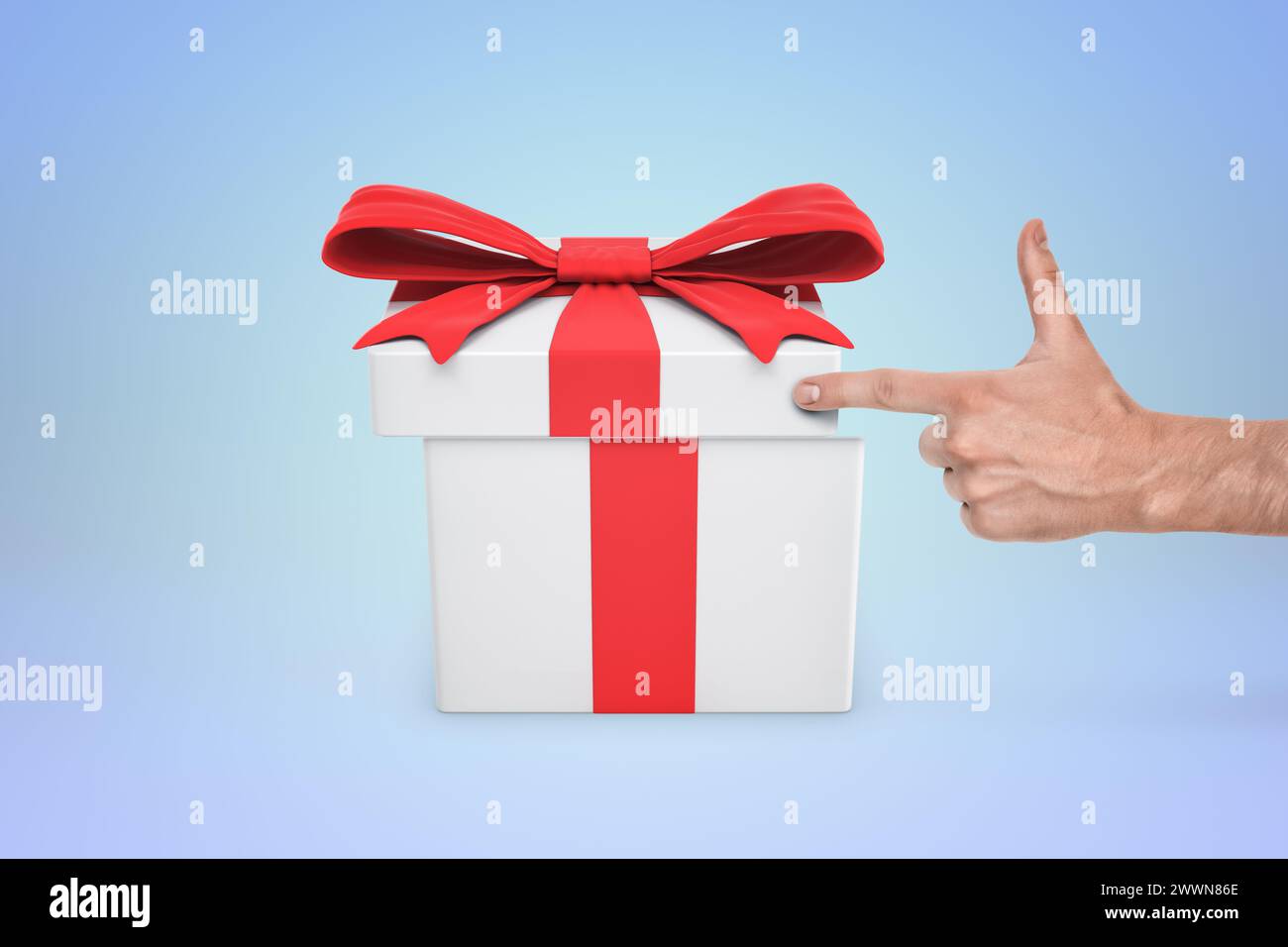 Finger indicating a sliced gift box in mid-air Stock Photo - Alamy