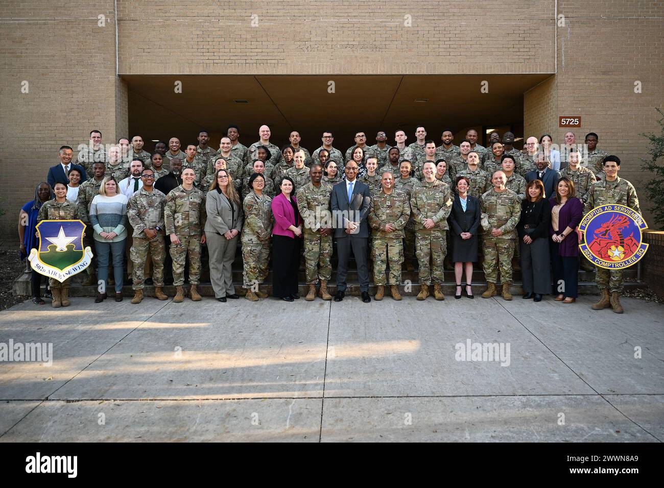 Members from the 502nd Comptroller Squadron pose for a group photo with ...