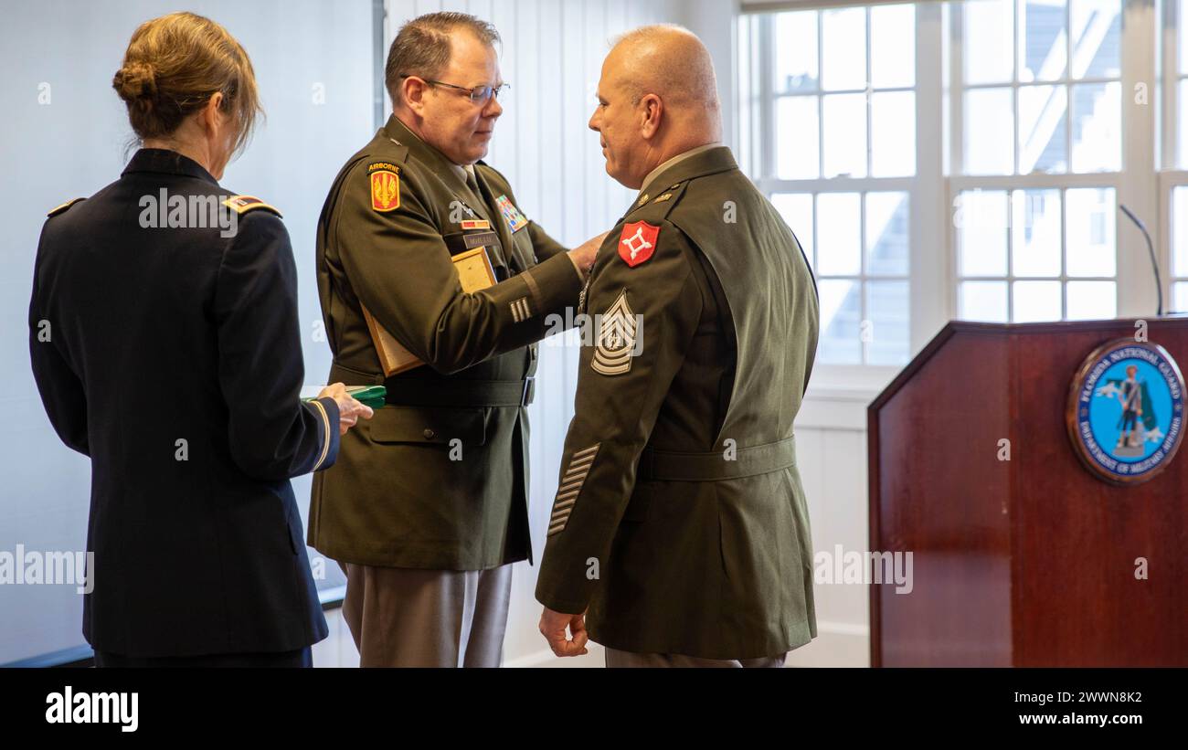 Brig. Gen. Sean Boyette awards Command Sgt. Maj. Theodore Morris the ...