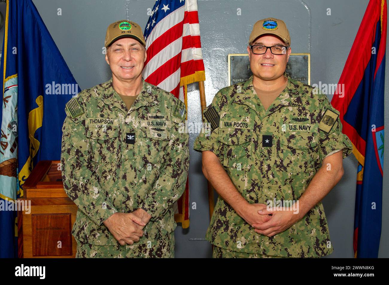 APRA HARBOR, Guam (Feb. 7, 2024) – Capt. Michael Thompson, left ...