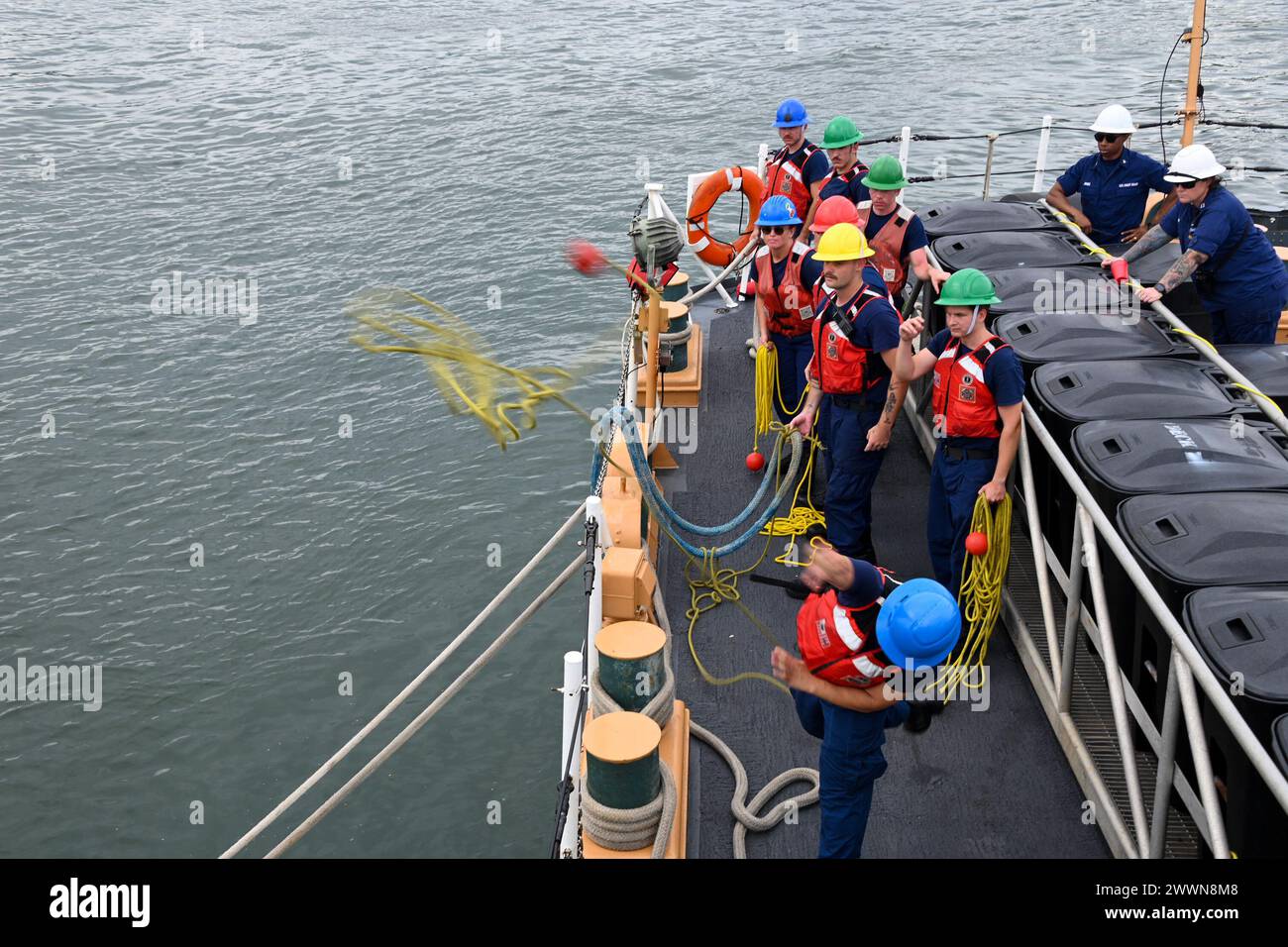 U.S. Coast Guard Cutter Harriet Lane (WMEC 903) crew prepare to moor in ...