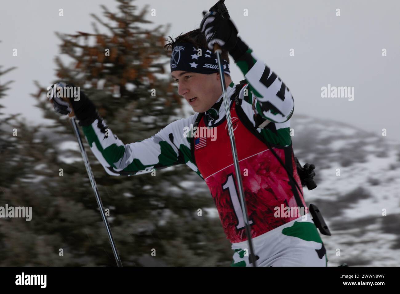 Spc. Vlad Kapustin, Vermont National Guard, climbs an incline while ...