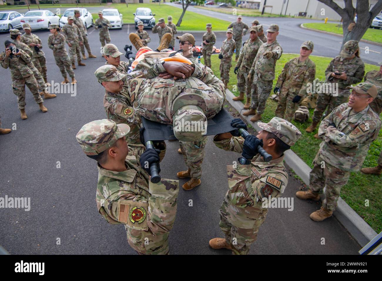 The 624th Aeromedical Staging Squadron members simulated loading ...