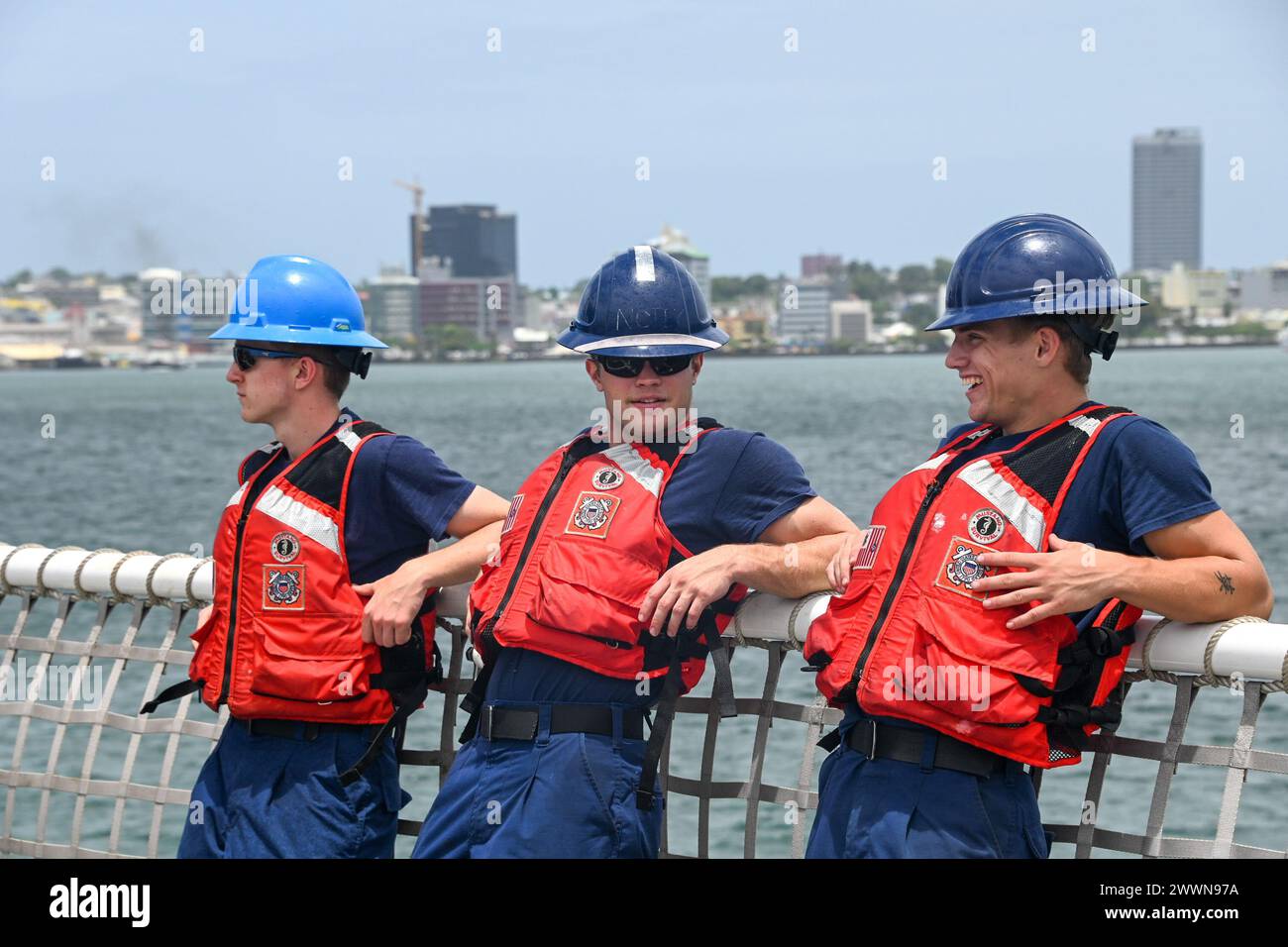 U.S. Coast Guard Cutter Harriet Lane (WMEC 903) crew wait to transit ...