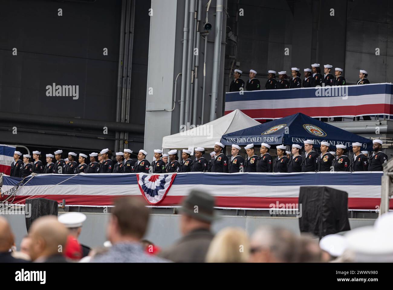 U.S. Sailors assigned to the expeditionary sea base USS John L. Canley ...