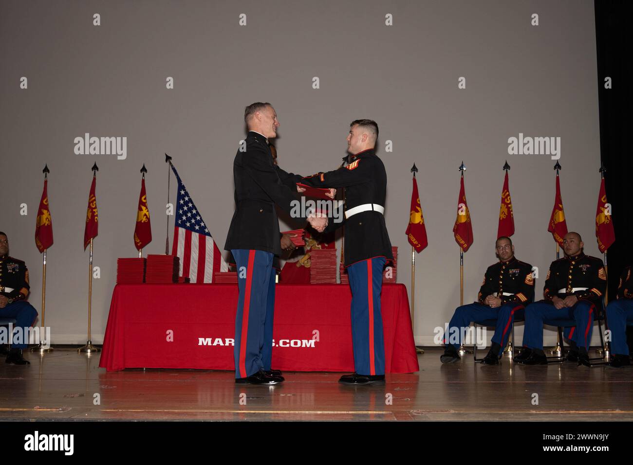 U.S. Marines with Marine Corps Recruiting Command are awarded their ...