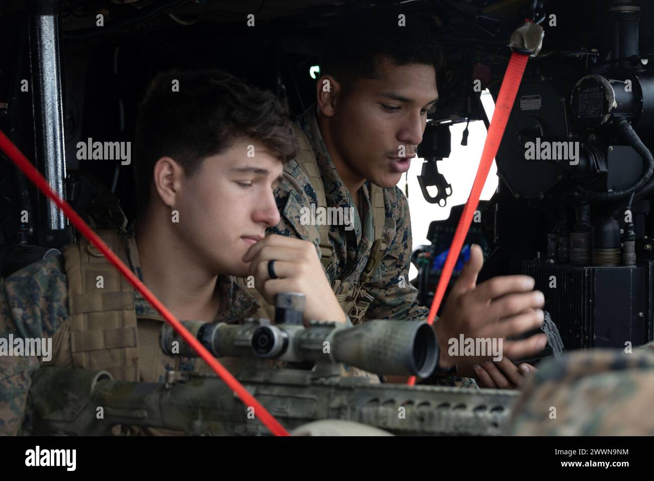 U.S. Marine Corps Cpl. Tevita Fukofuko, right, and Sgt. Jesse McManigle, both scout snipers with ...
