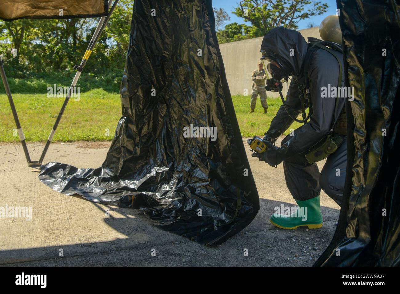 A U.S. Marine Corps Marine participates in a chemical, biological ...